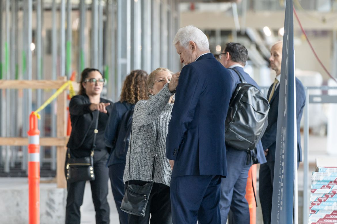 Photo | Carol Block reaches out to touch Chancellor Gene Block, with ...