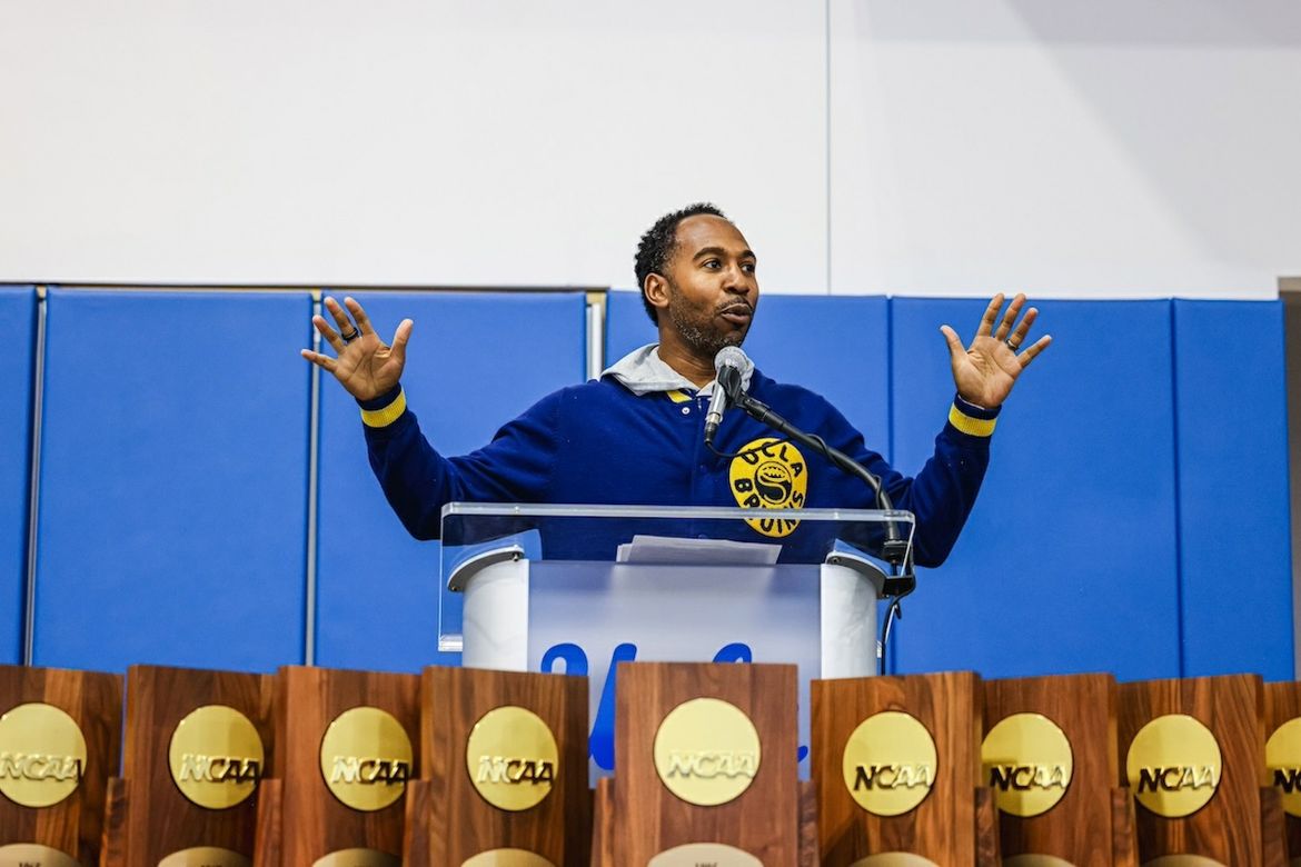 Photo | UCLA Athletics Director Martin Jarmond stands at podium in ...