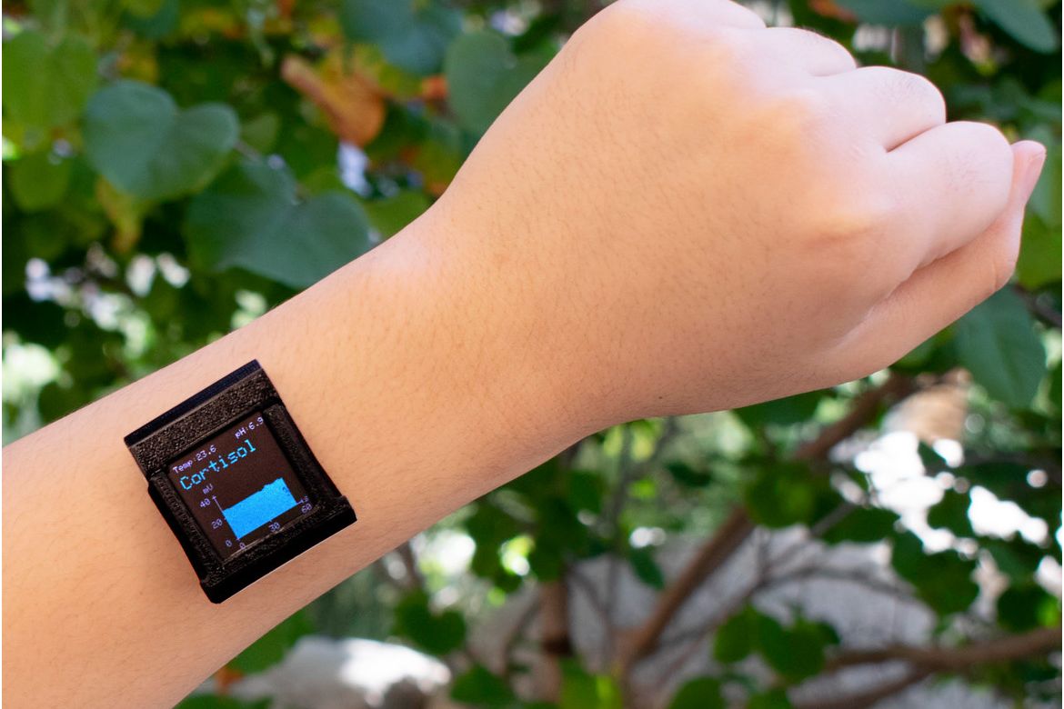 Photo | Biosensor shown above wrist | UCLA