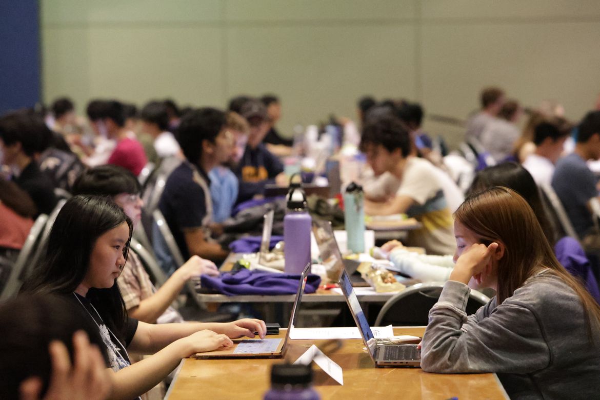 Photo | Students with laptops participating in DataFest | UCLA