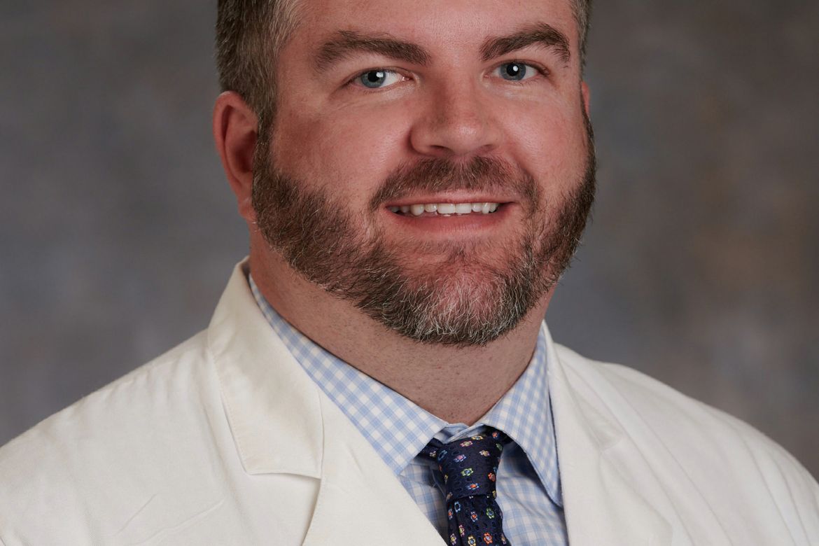 Photo | Russell Buhr in white coat | UCLA