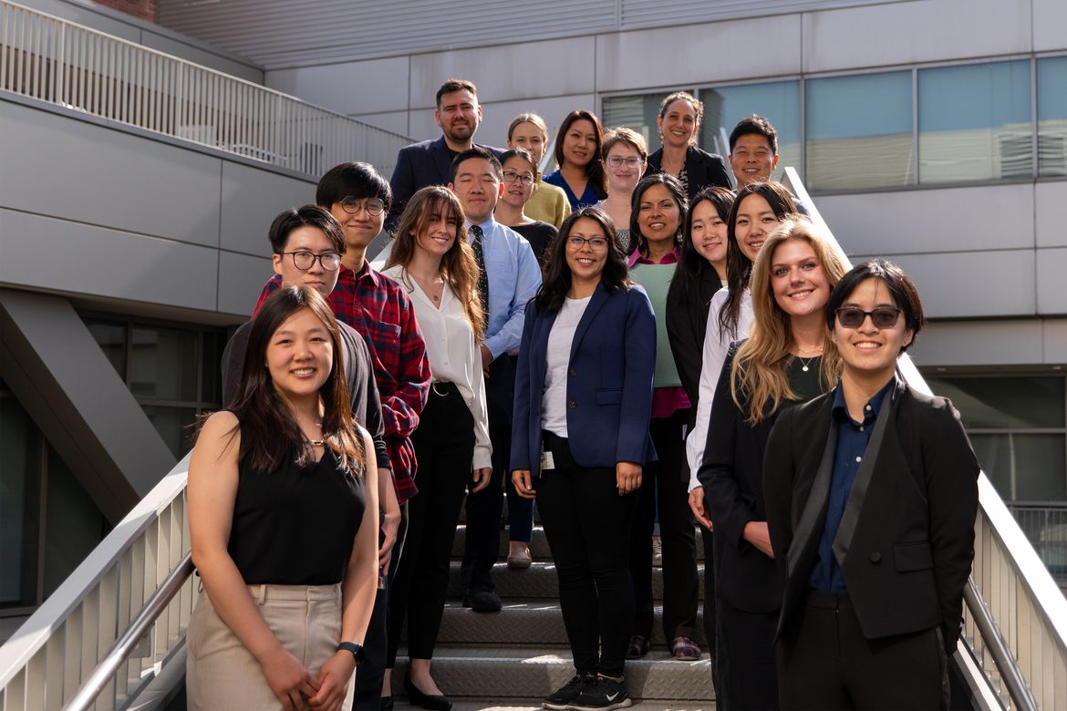 Photo | Group including undergrad students stand on steps in front of ...