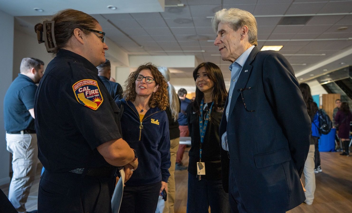 Photo | Chancellor Julio Frenk speaks with representative of CAL FIRE ...