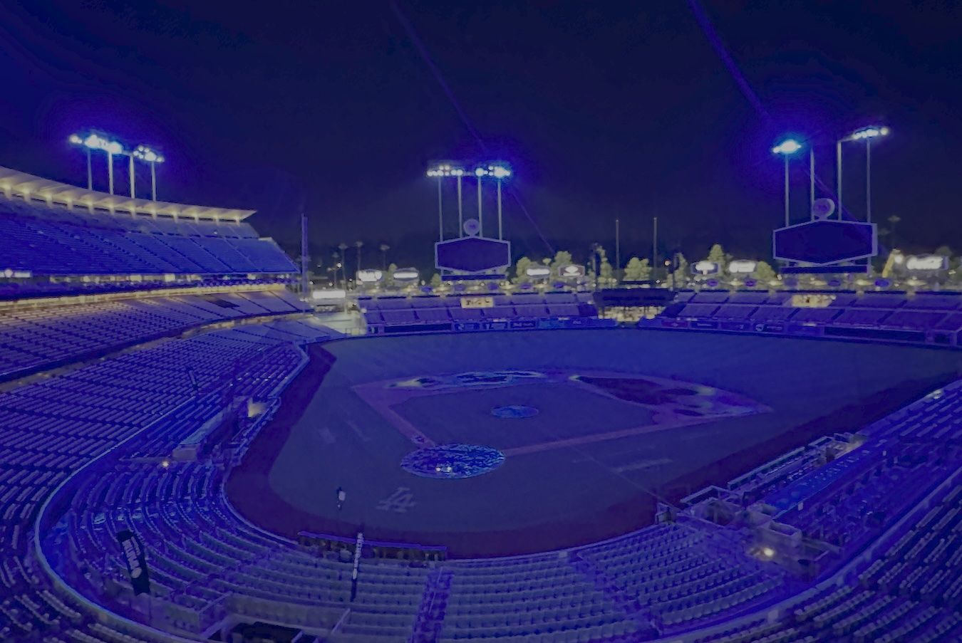 Photo | Wide shot of Dodger Stadium lit up in blue | UCLA