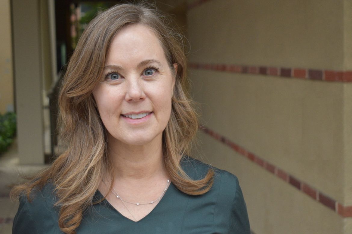 Photo | Head-and-shoulders photo of Heather Dallas in green top | UCLA