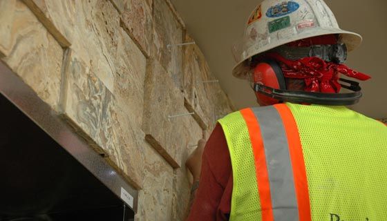 Crews Work to Repair Tiles at ‘The Pit’ in Time for Basketball Season ...