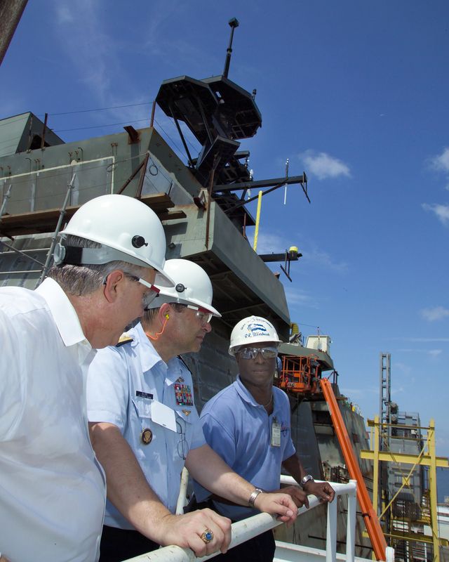 Photo | U.S. Coast Guard Rear Adm. Gary T. Blore, center, program ...