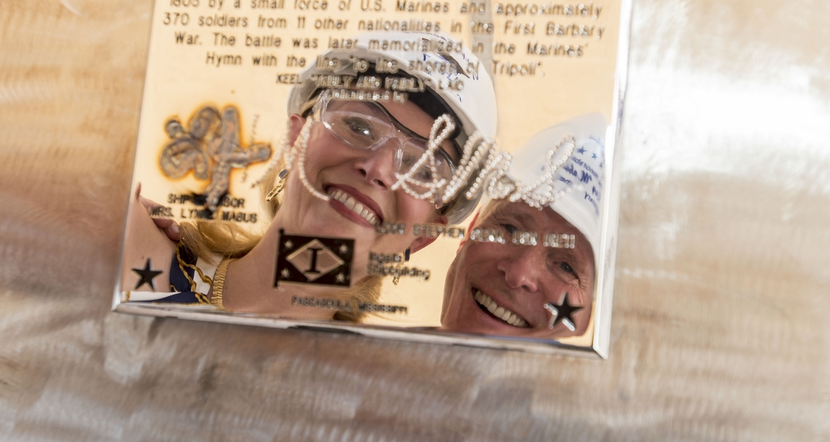Photo | Lynne and Ray Mabus Reflected in Tripoli's Keel Plate | HII News