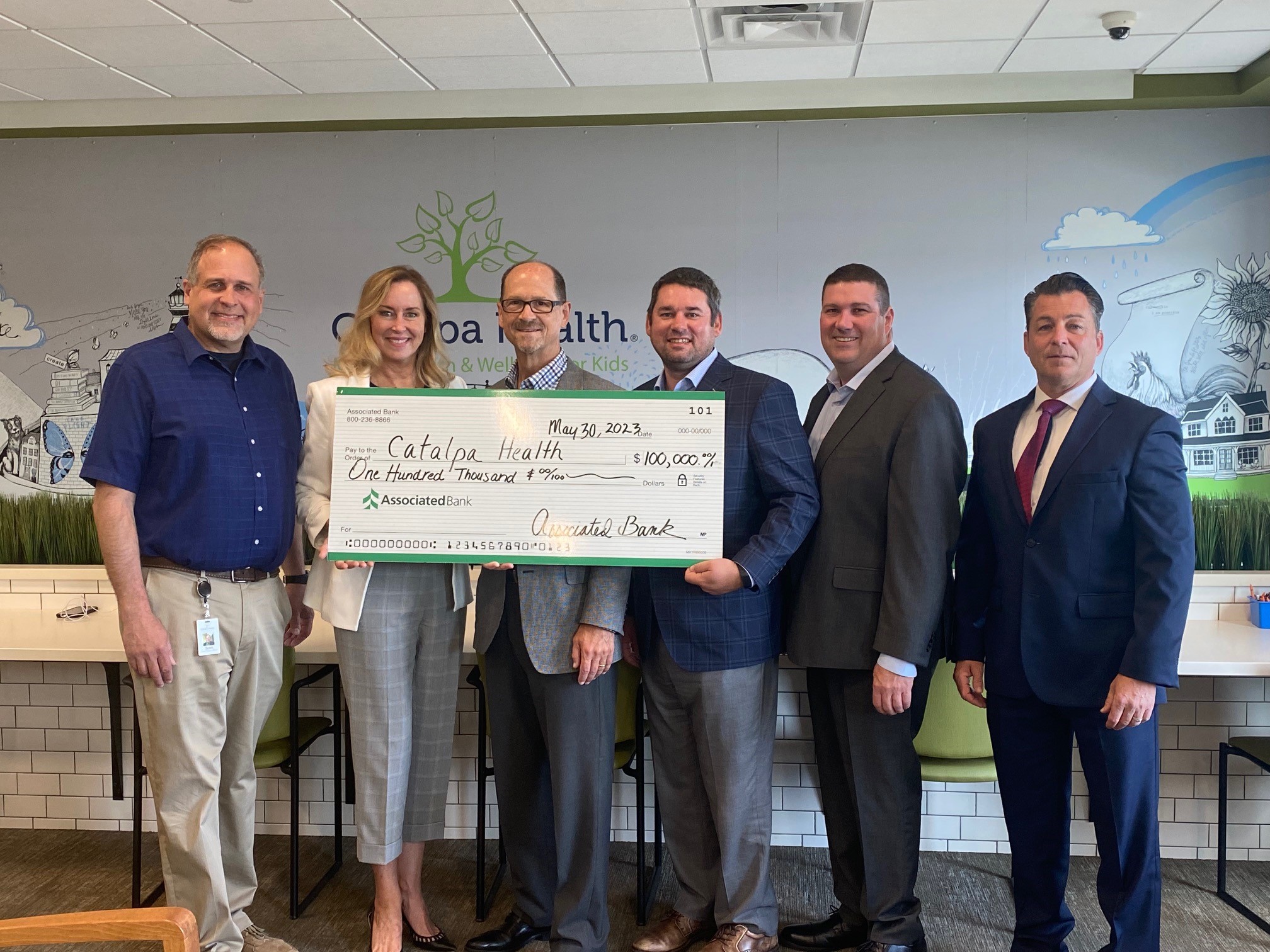 Associated Bank contributes $100,000 investment each to four nonprofits ...