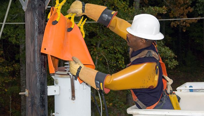 Linemen through the decades | Duke Energy | illumination