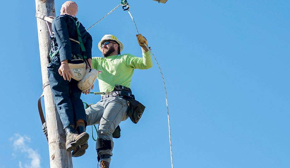 Climbing for a win at the lineman's rodeo | Duke Energy | illumination
