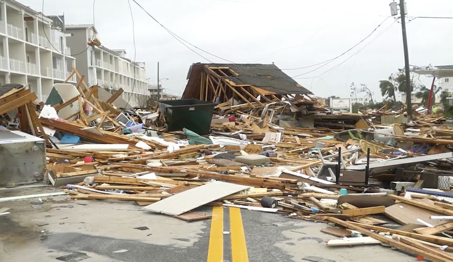 Helicopters replace massive transmission lines toppled by Hurricane ...