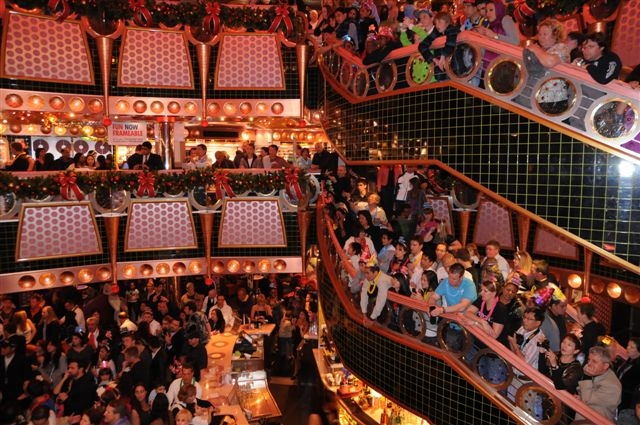 Photo | Guests on the Carnival Splendor also gathered in the atrium for ...