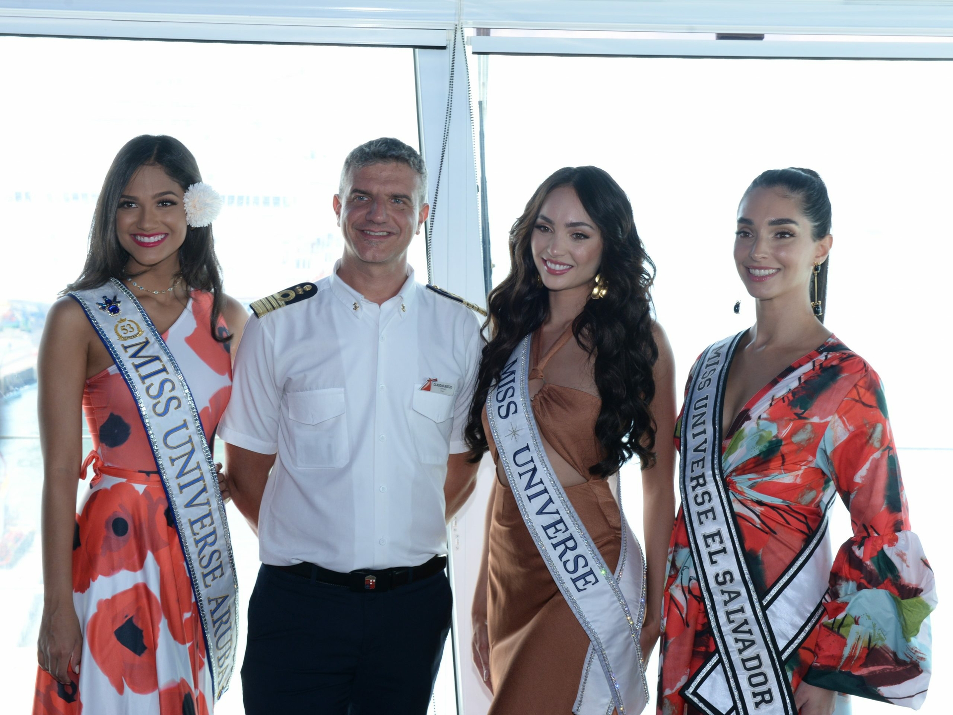 Photo | Miss Universe Titleholders pose with Captain Claudio Bozzo-min ...