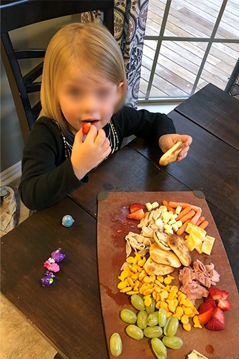 Photo | child snacking | American Heart Association