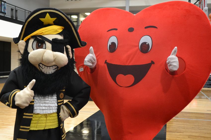 Photo | Southwestern University and American Heart Association mascots ...