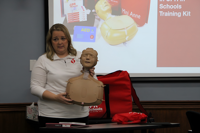 Photo | Amber Higbie with CPR Kit | American Heart Association