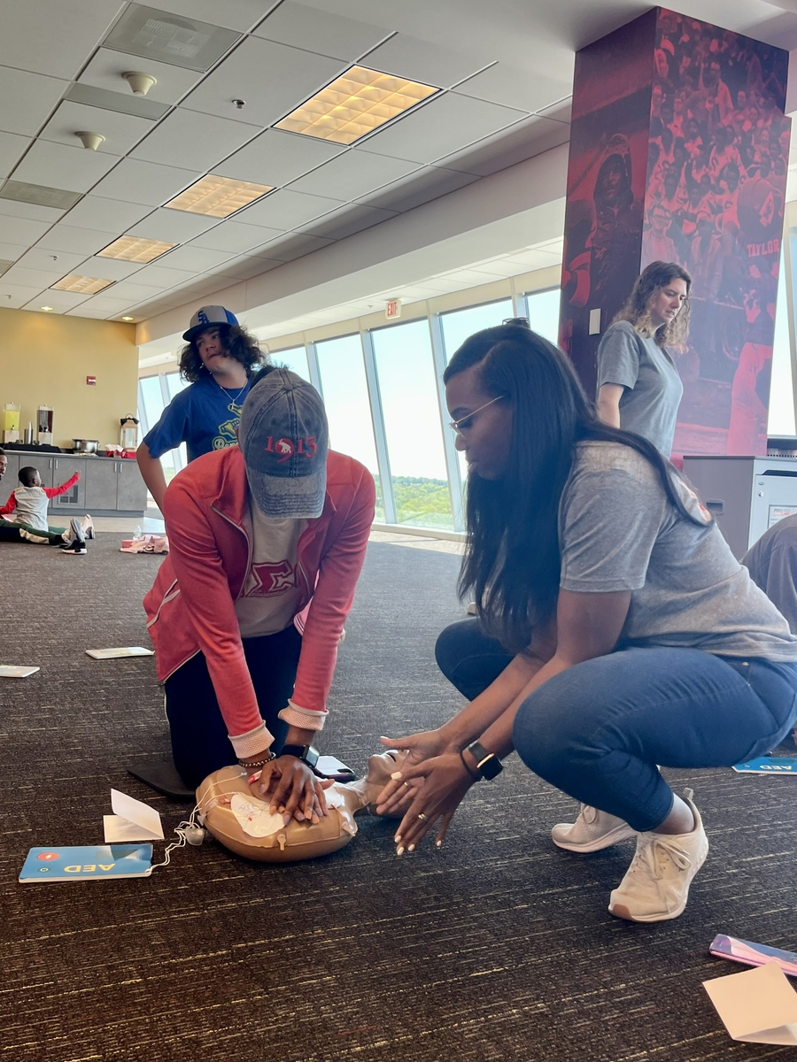 Photo | CPR training at Chiefs' event | American Heart Association