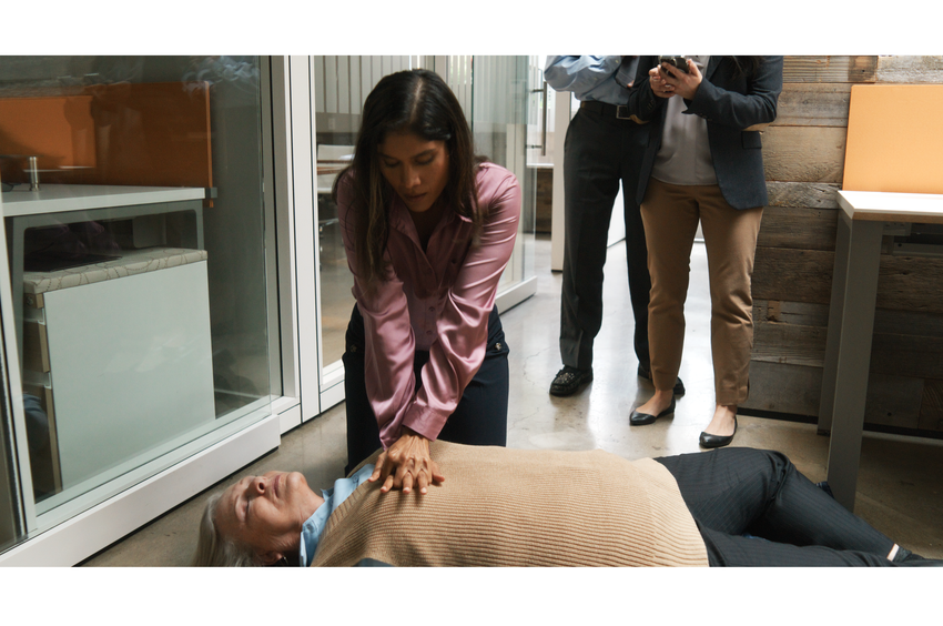 Photo | CPR in the office reenactment | American Heart Association