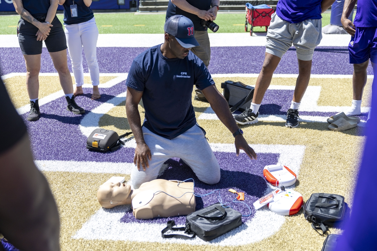 Photo | NOL - SFD Firefighter Greg Bogans demonstrates an AED ...