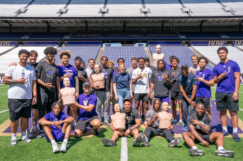 Photo | NOL - Kaila and Greg pose with team members | American Heart ...