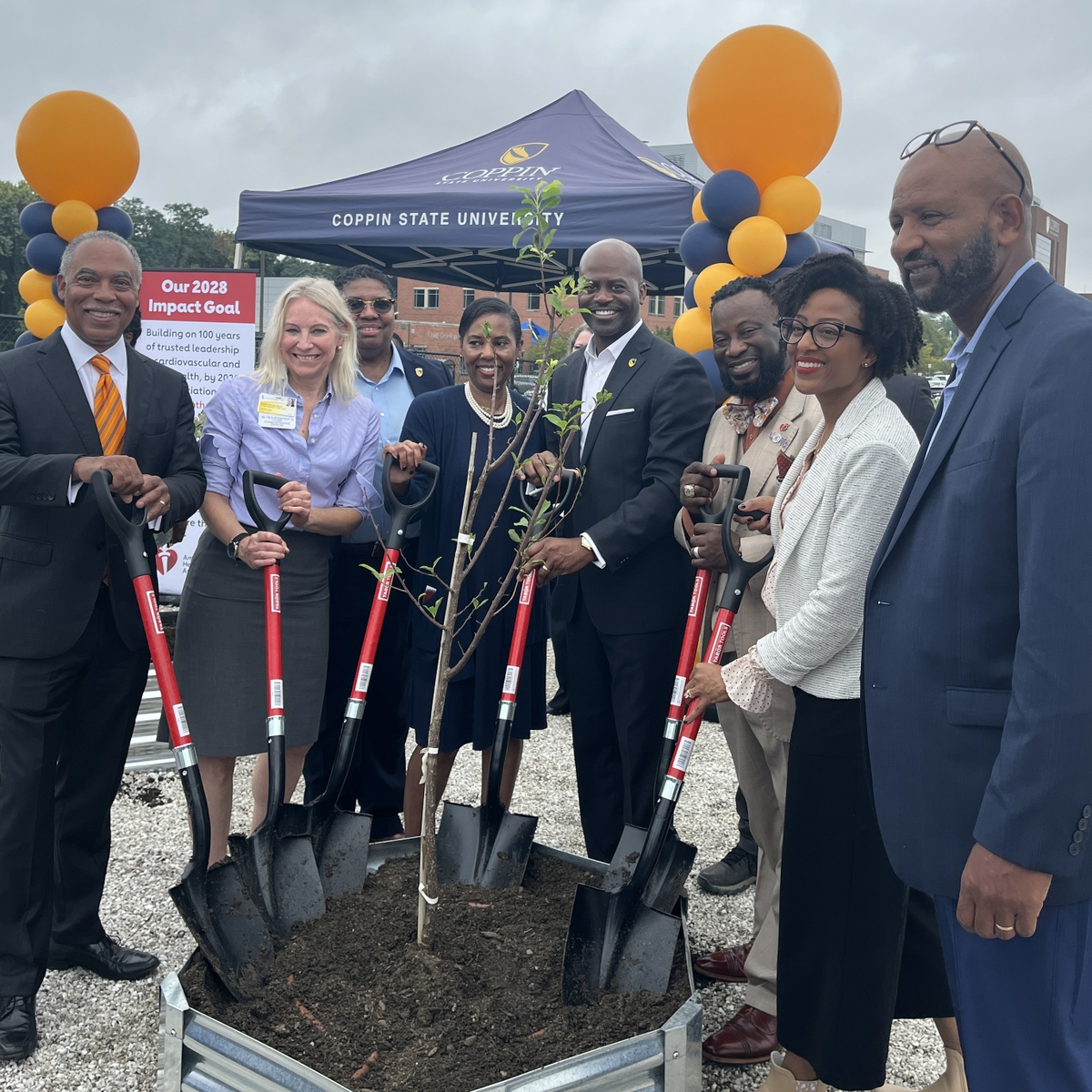 Revitalized community garden opens on campus of Coppin State in ...