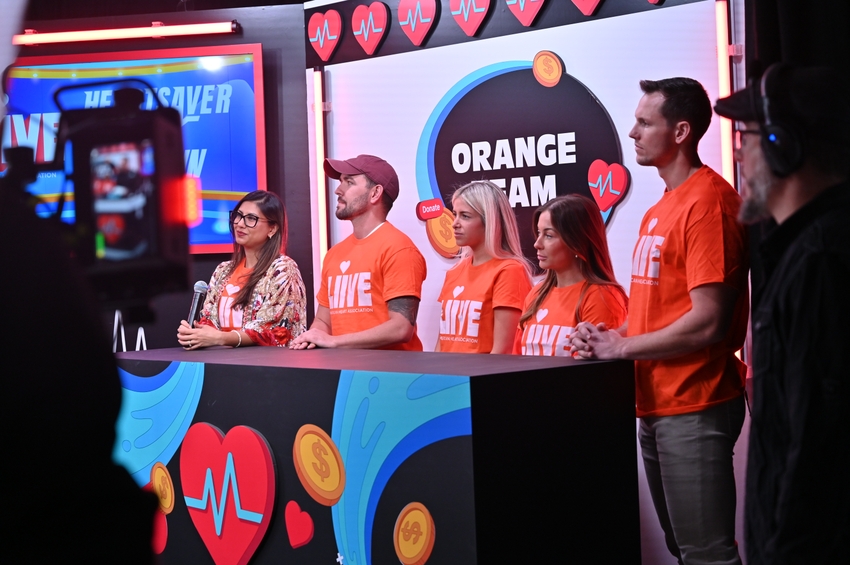 Photo | Orange Team Playing Heartsaver Heroes Showdown Game | American ...
