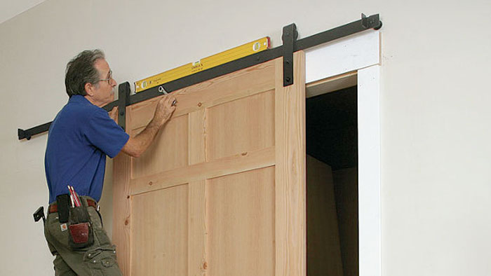 How to Install a Sliding Barn Door - Fine Homebuilding