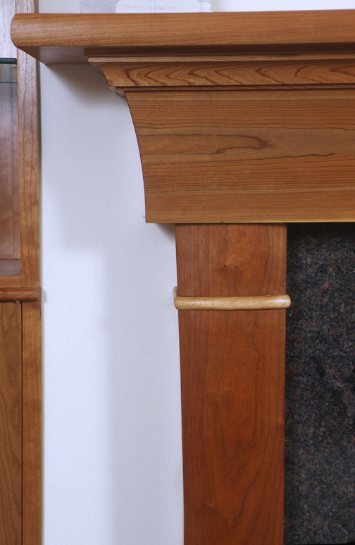 Cherry fireplace mantel and curved cabinets - Fine Homebuilding
