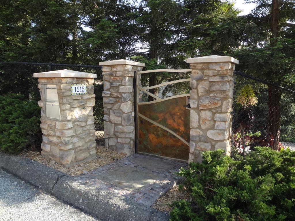 Etched-Copper Mountain Gates - Fine Homebuilding