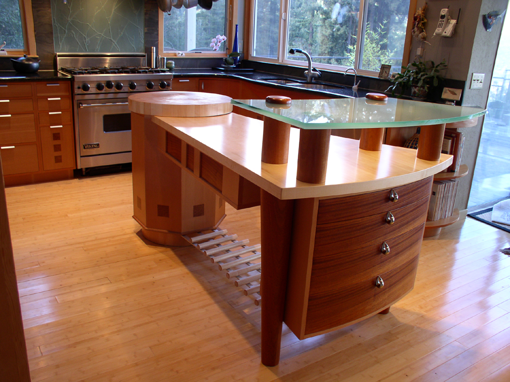 Curvy Kitchen Island does many jobs. - Fine Homebuilding