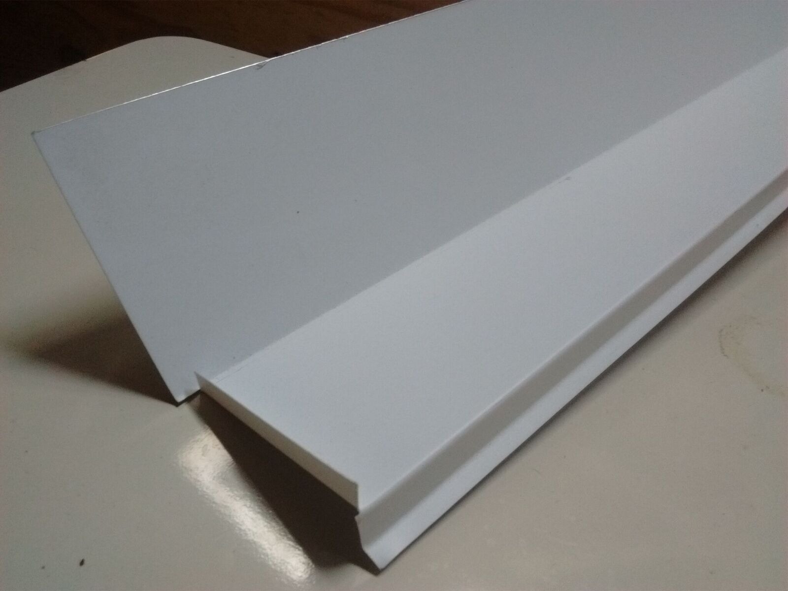 How to Install a Better Window Head Trim and Drip Cap - Fine Homebuilding