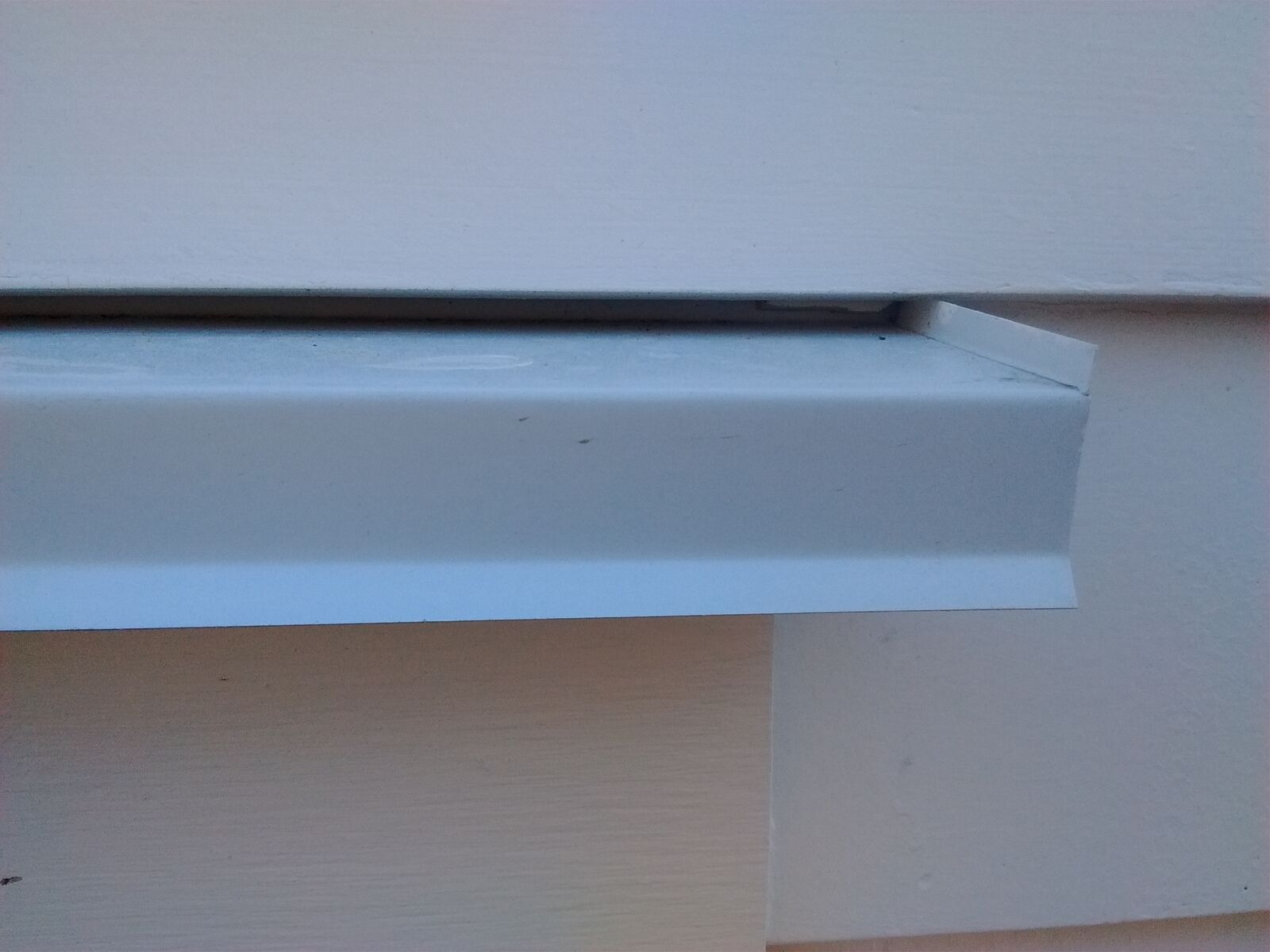 How to Install a Better Window Head Trim and Drip Cap - Fine Homebuilding