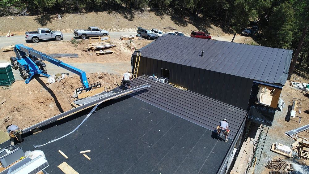Installing Standing-Seam Roofing and Cladding - Fine Homebuilding