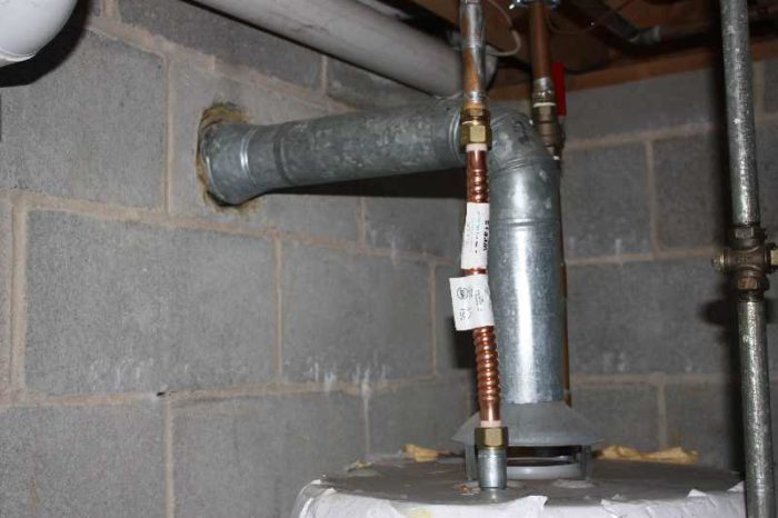 Slanting the vent flue of water heater - Fine Homebuilding