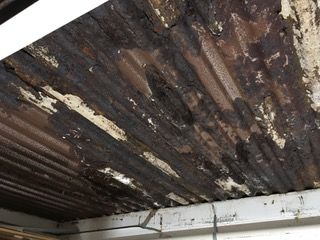 Rusted galvanized steel decking under concrete garage floor - Fine ...