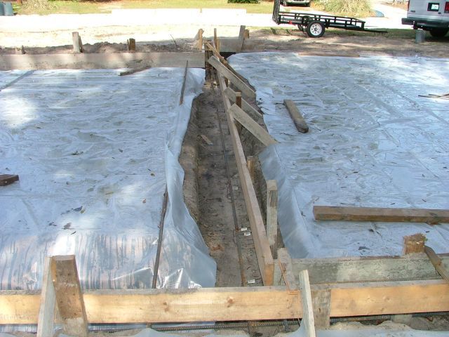 Pour the whole thing, at once. Slab on grade with thickened edges ...