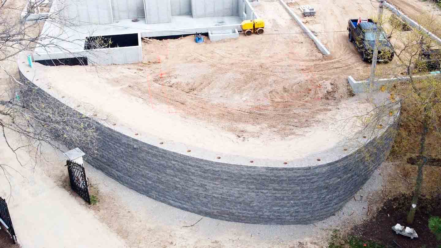 Creating a Level Backyard on a Sloped Lot - Fine Homebuilding