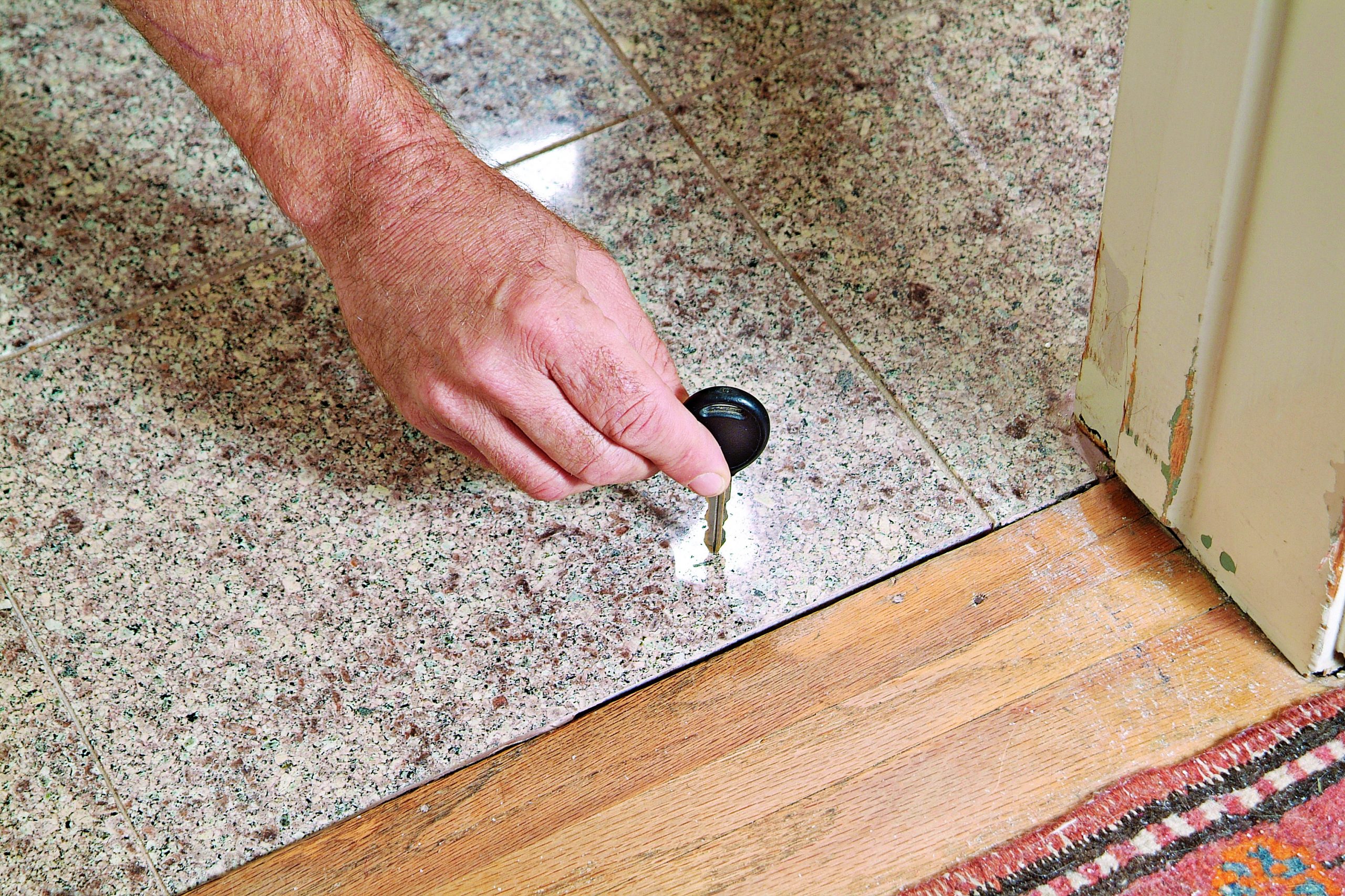 Removing a Damaged Tile - Fine Homebuilding