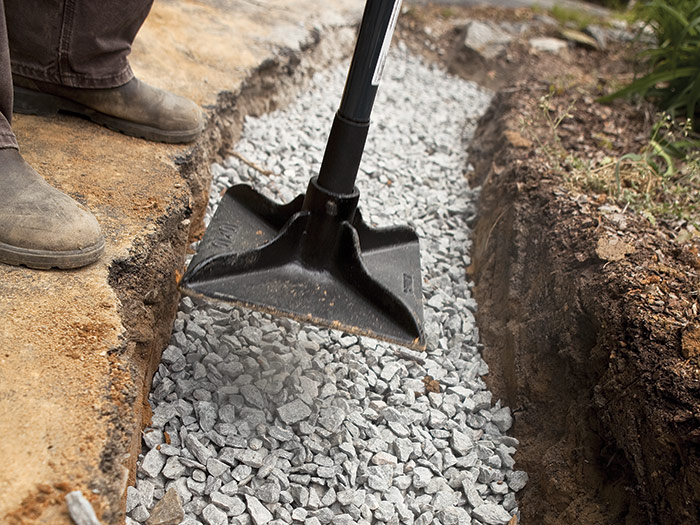 Setting the Footing for a Dry-Stack Retaining Wall - Fine Homebuilding