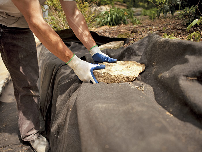 Setting the Footing for a Dry-Stack Retaining Wall - Fine Homebuilding