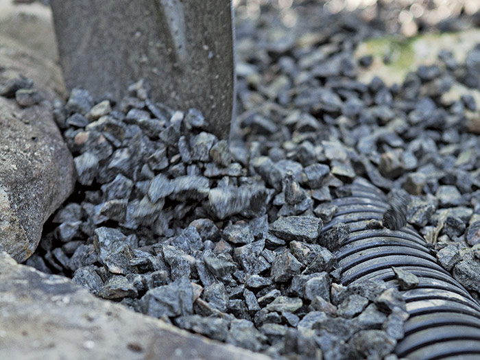Adding a Drain Line for a Dry-Stack Retaining Wall - Fine Homebuilding