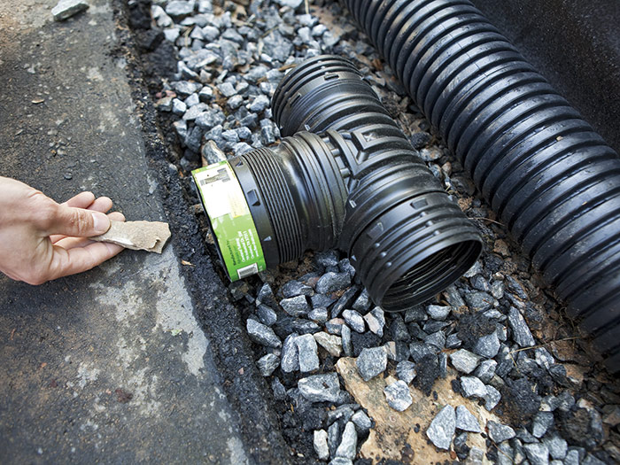 Adding a Drain Line for a Dry-Stack Retaining Wall - Fine Homebuilding