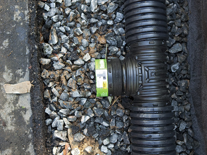 Adding a Drain Line for a Dry-Stack Retaining Wall - Fine Homebuilding