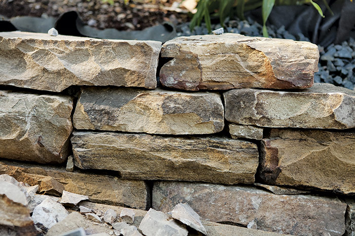 Setting the Stones for a Dry-Stack Retaining Wall - Fine Homebuilding