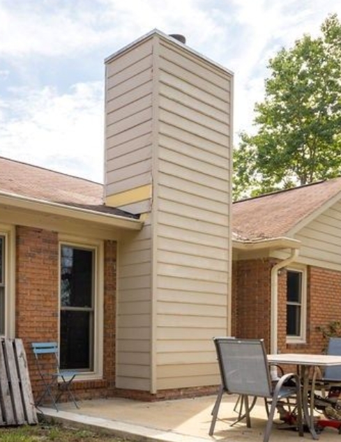 Install windows in exterior fireplace chase - Fine Homebuilding