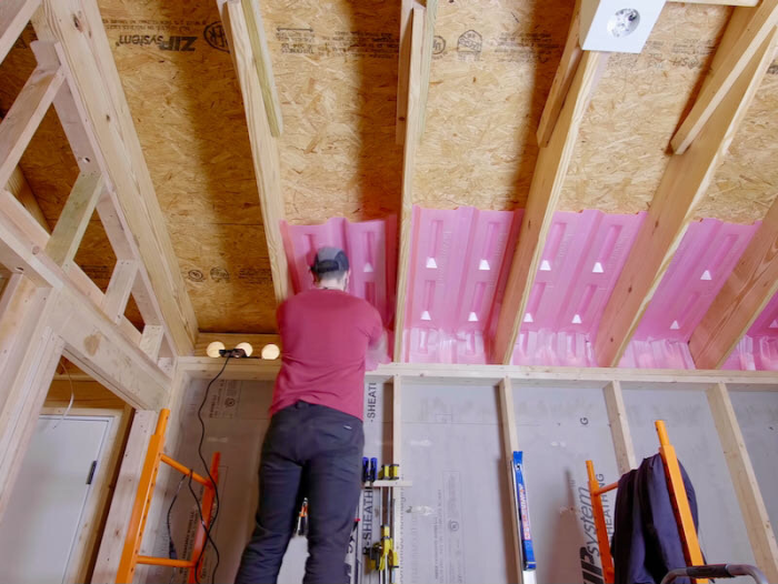 Who is responsible for insulation dam and keeping loose fill out of ...