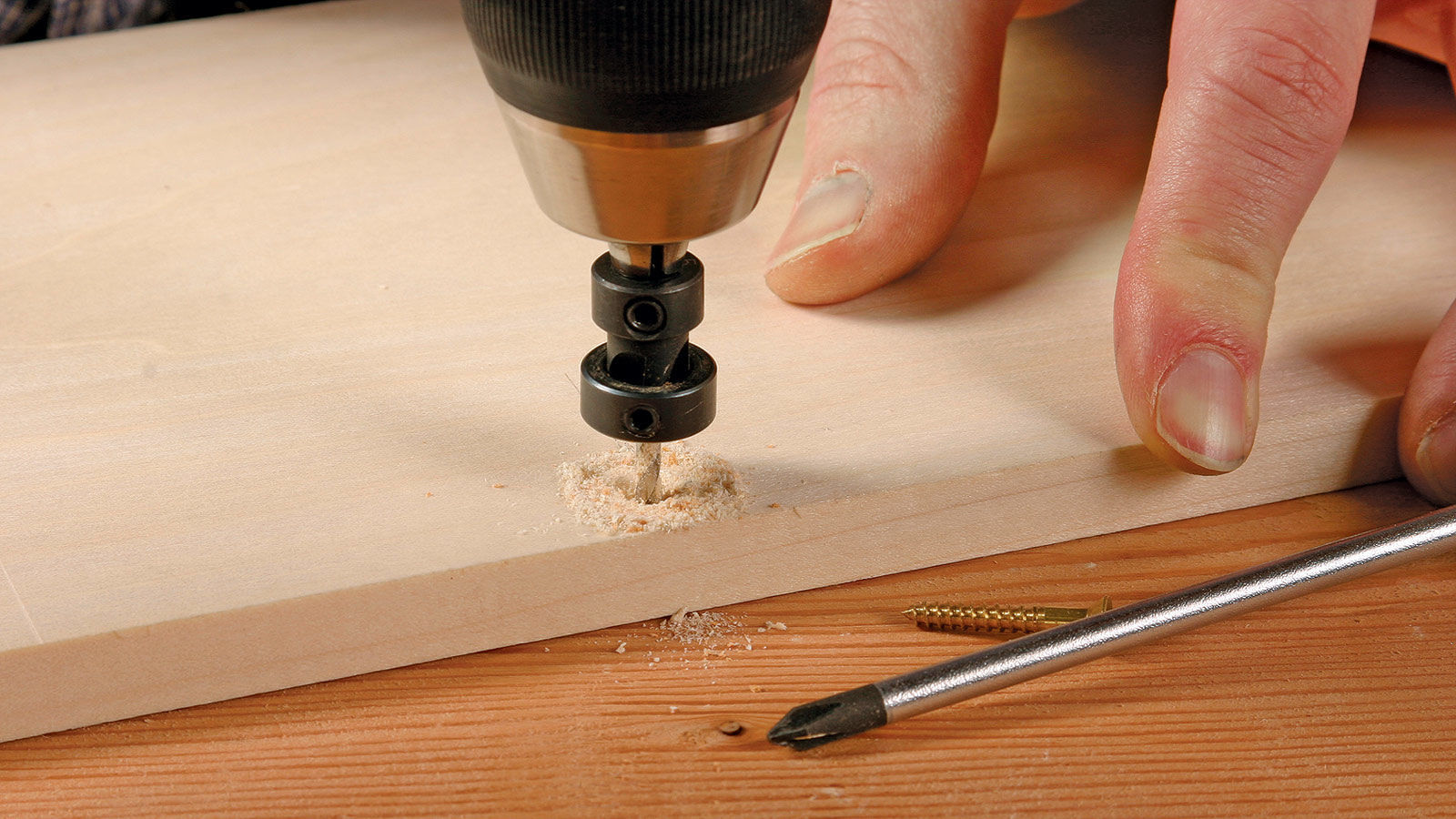Cut Slotted Screw Holes in a Drawer Bottom - FineWoodworking