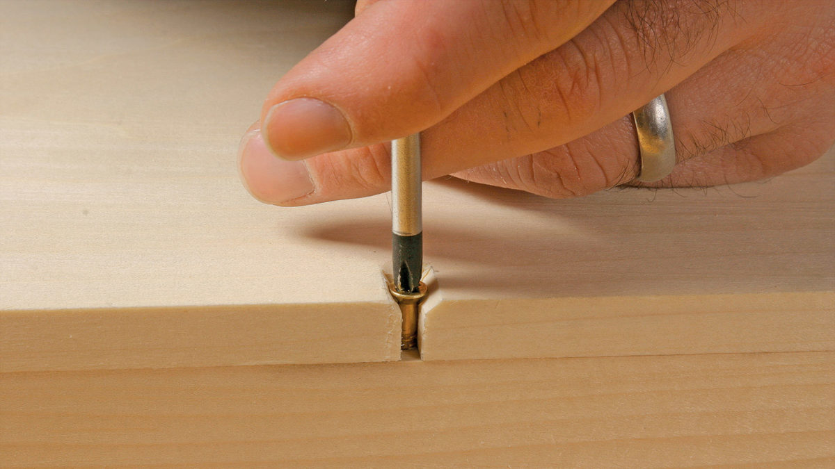Cut Slotted Screw Holes in a Drawer Bottom - FineWoodworking