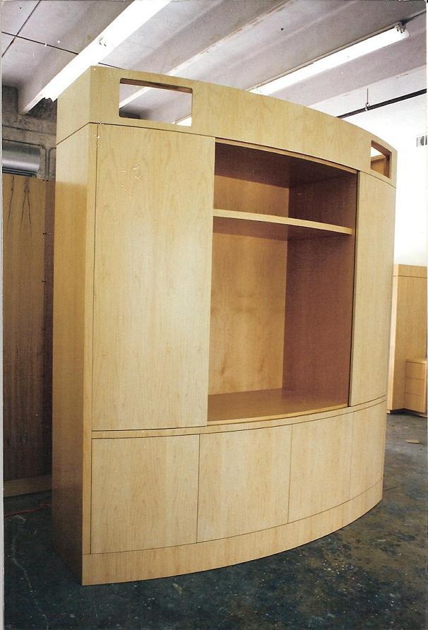 Curved Motorized Maple Wall Unit - FineWoodworking